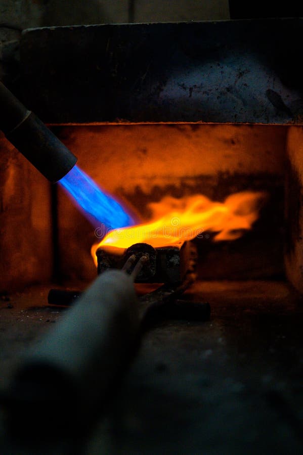Closeup of a Flame-lit Torch Placed Inside an Oven Stock Photo - Image ...