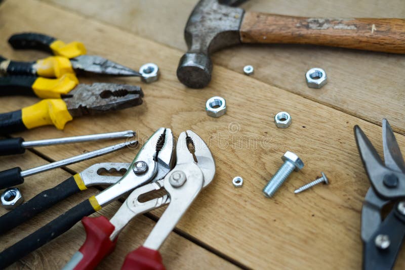 Closeup Flat Lay of Tools on a Wooden Surface Stock Photo - Image of ...