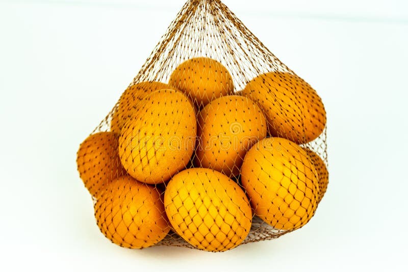 Closeup Focus Shot of Golden Eggs in a Net Bag Stock Photo - Image of ...