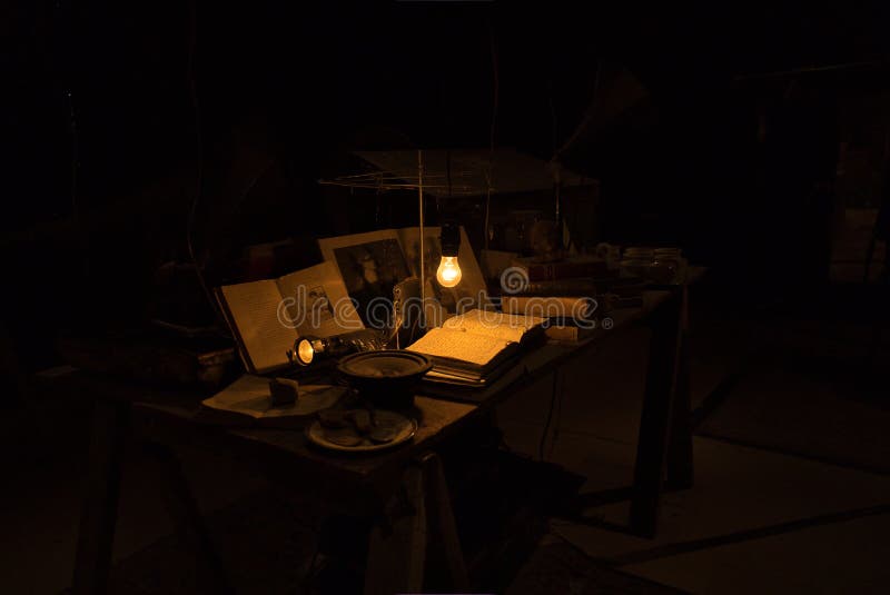 Closeup Focus Shot of Various Objects on the Table Under Dim Lighting ...