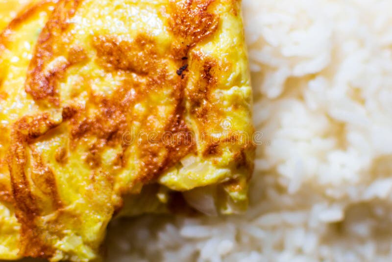 Closeup of a Folded Egg Omelet on Rice for Dinner Meal Stock Photo ...