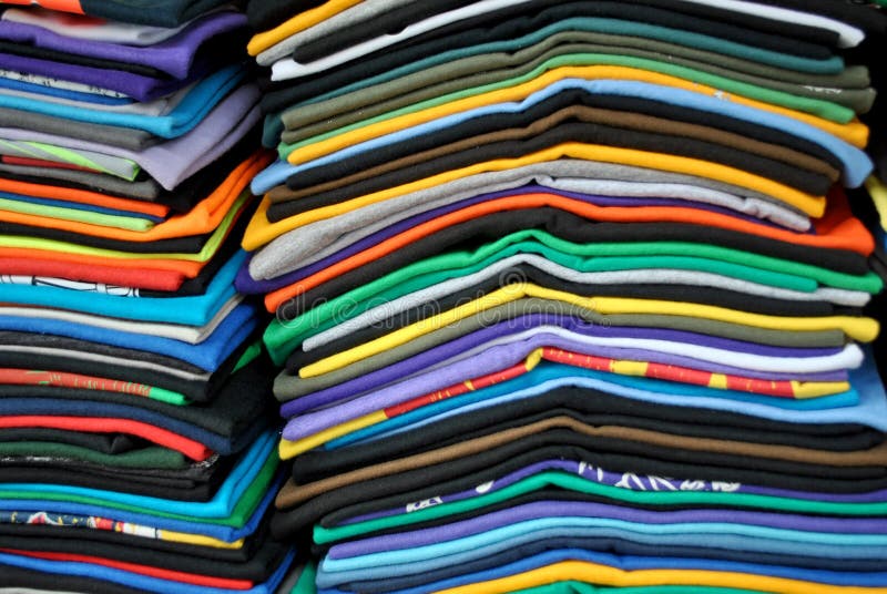 Closeup of Folded Stack of T-Shirts Stock Image - Image of polyester ...