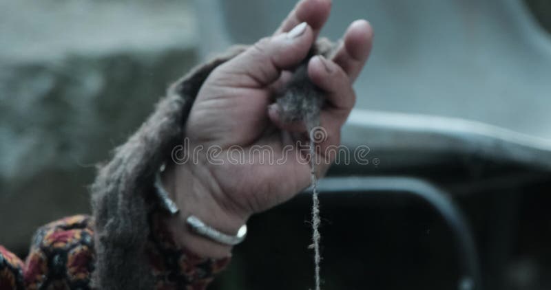 Closeup Footage of Old Woman S Hand Pulling Wool To Make a Wool Bobbin ...