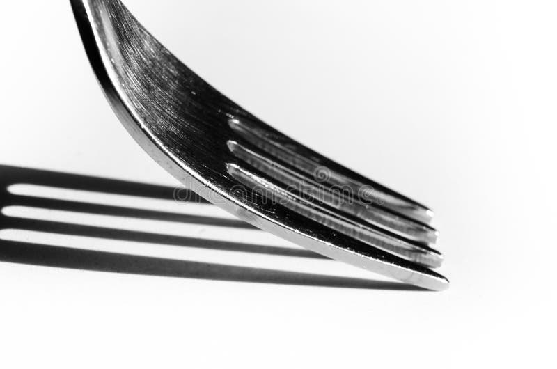 Close-up of a Fork with Hard Shadow Stock Image - Image of shadow ...