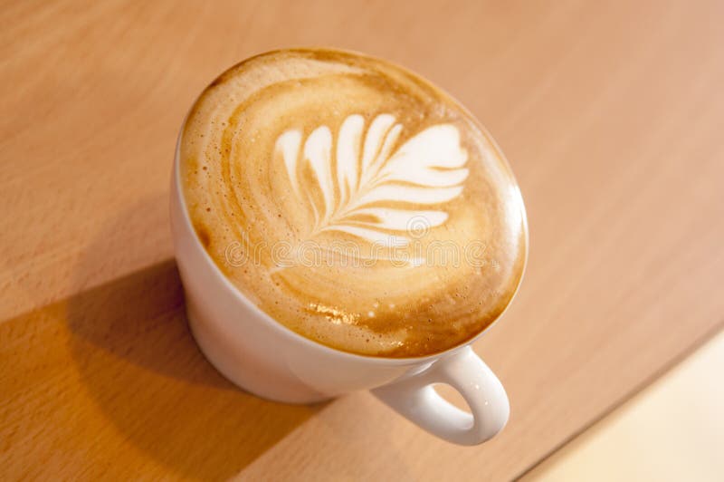 Closeup of Fresh Cafe Latte in Cup on Wooden Surface Stock Photo ...