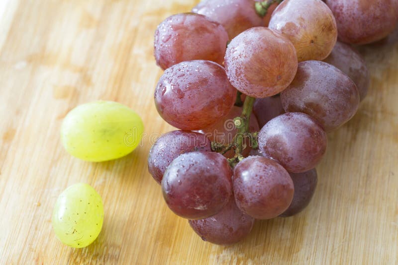 Fresh grapes on the table. stock image. Image of dessert - 98549511