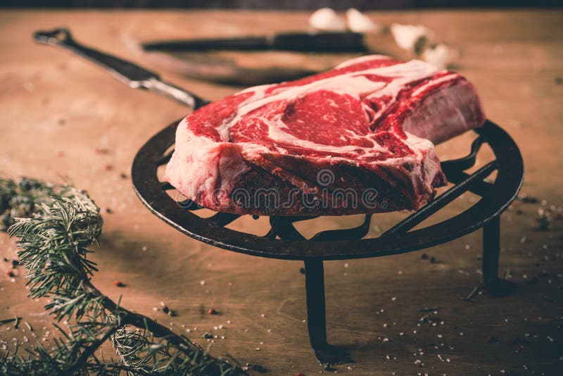 Closeup of Fresh Raw Meat on a Metal Stand Stock Photo - Image of food ...