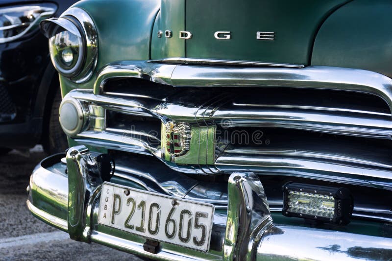 Closeup of the Front of Vintage Dodge Car with Green and Silver Chrome ...
