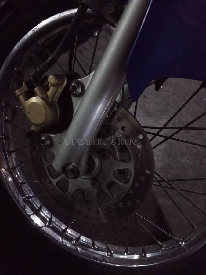 Closeup of the Front Wheel and Front Brake System of the Motorbike ...