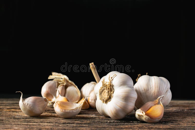 Closeup Garlic on Wooden Texture on for Cooking on Dark Background ...