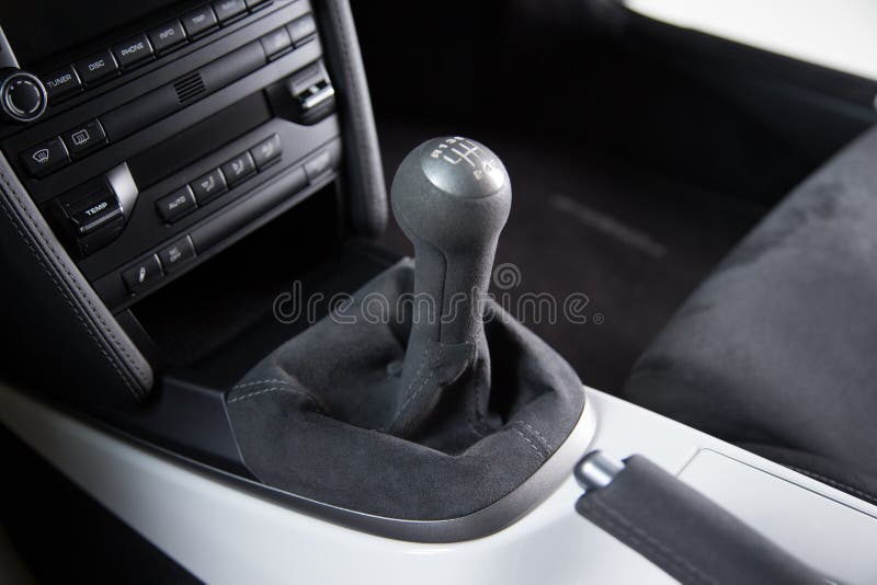 Closeup of the Gear Shift and Control Buttons of a Modern Car Under the ...