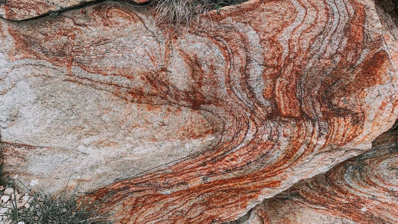 Closeup of Geologic Rock Surface with Red Wavy Pattern Stock Image ...