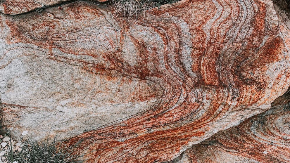 Closeup of Geologic Rock Surface with Red Wavy Pattern Stock Image ...