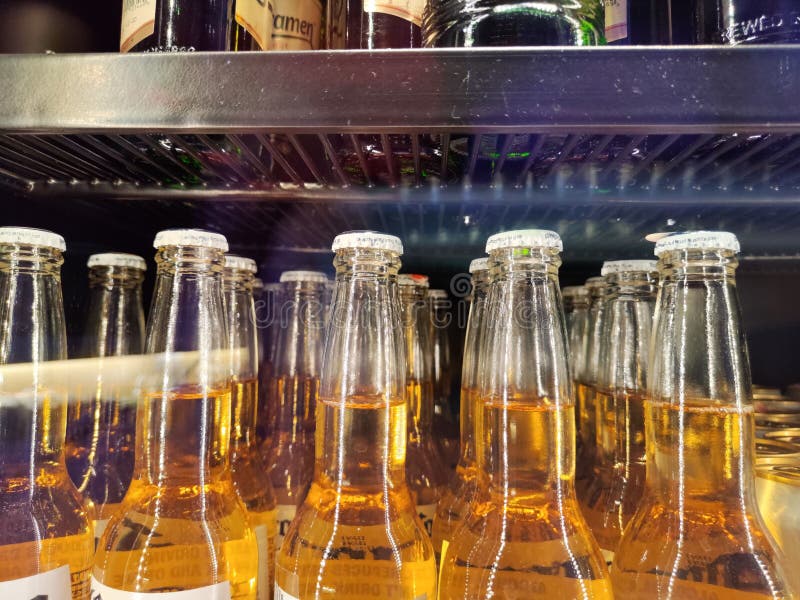 Closeup of Glass Bottles with Beer in a Factory Stock Image - Image of ...