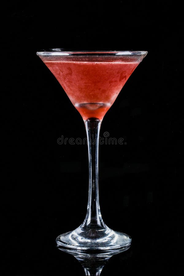 Glass with Cosmopolitan Cocktail on the Edge of the Pool in a Resort ...