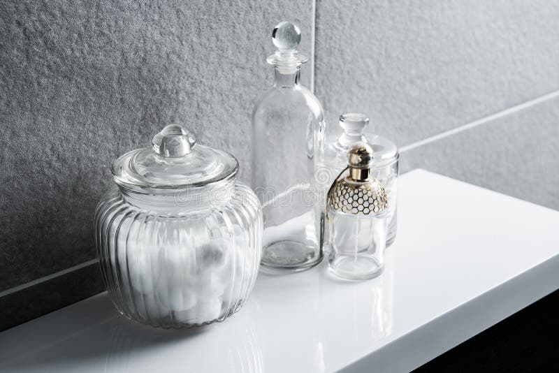 Closeup of Glass Jars and Bottles on a White Counter Stock Photo ...