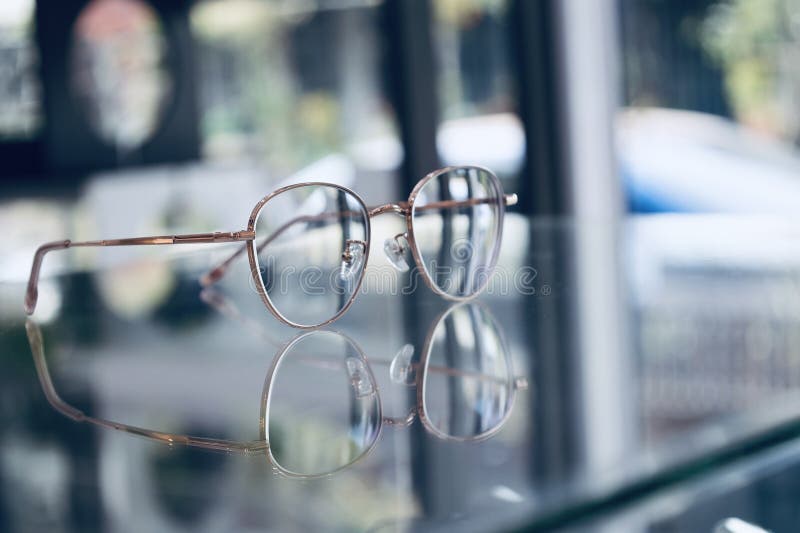Closeup of a Glasses on Table in Optical Store Stock Photo - Image of ...