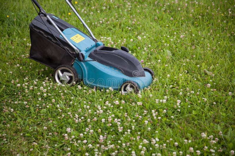 Closeup of grassmower stock photo. Image of lawn, gardening - 96143254