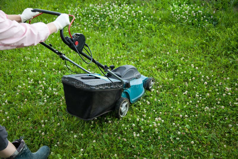 Closeup of grassmower stock image. Image of work, trim - 96143303