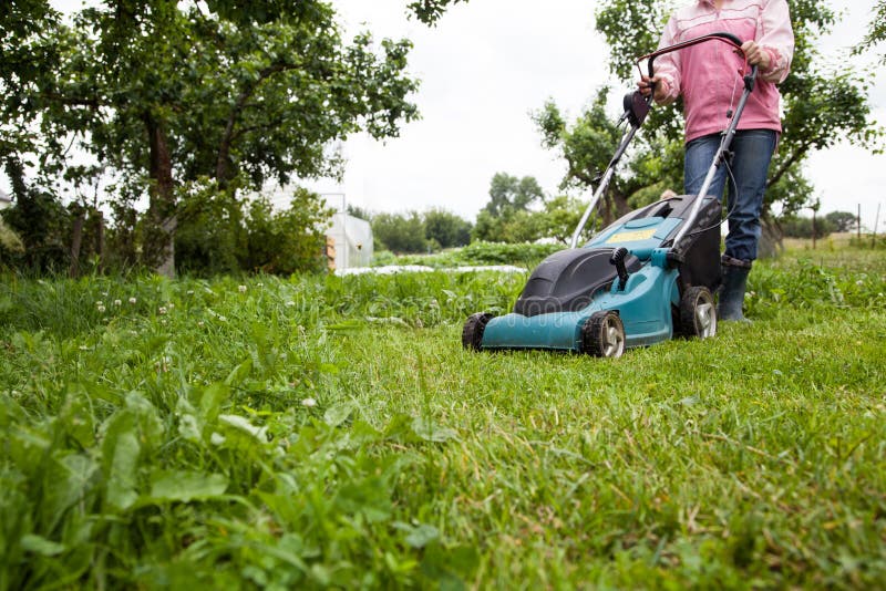 Closeup of grassmower stock photo. Image of work, fresh - 96143562