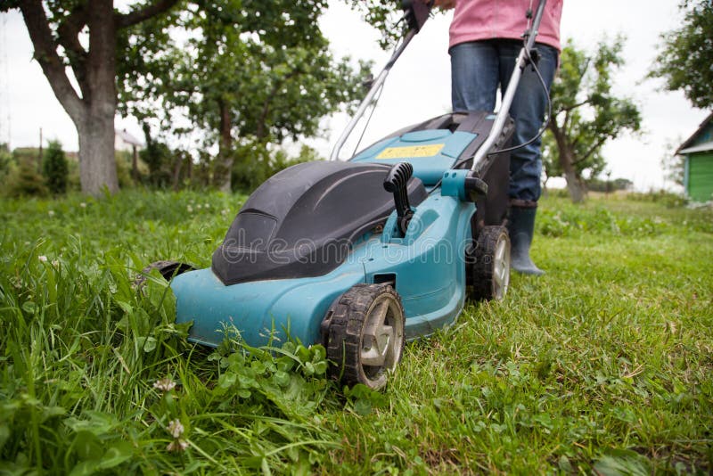 Closeup of grassmower stock photo. Image of gardening - 96143608