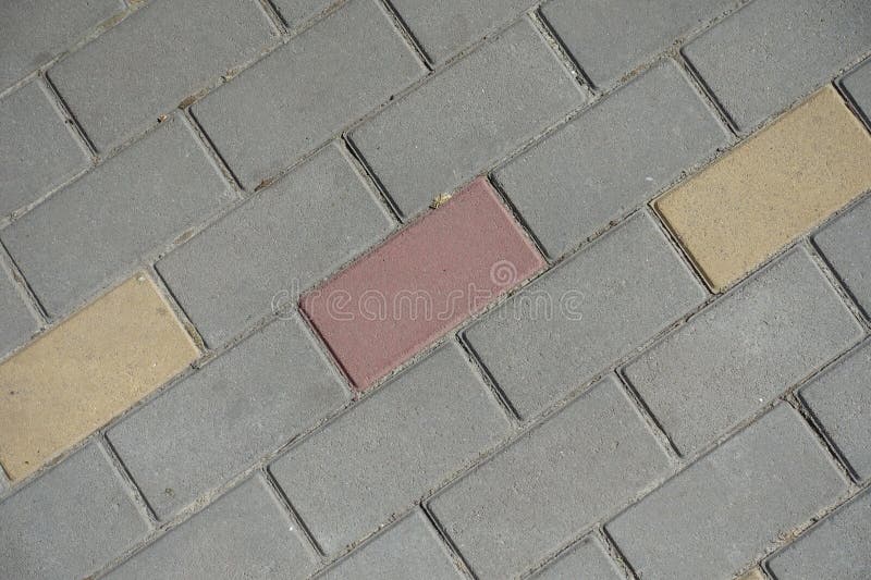 Closeup of Gray, Pink and Yellow Concrete Pavement with Stretcher Bond ...