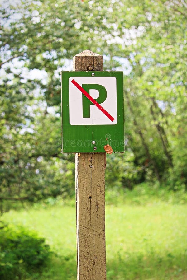 Closeup of a Green No Parking Sign Stock Photo - Image of area, limit ...