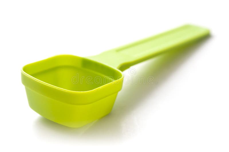 Green Plastic Dose Spoon on White Background Stock Image - Image of ...