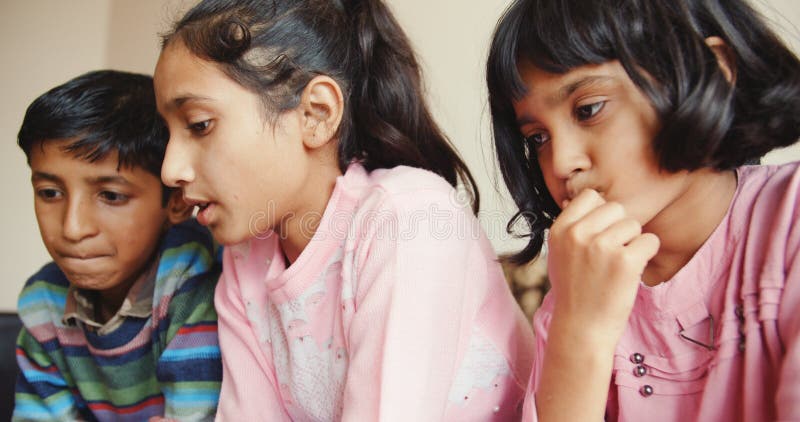 Closeup of the Group of Children Watching Something on the Tablet ...