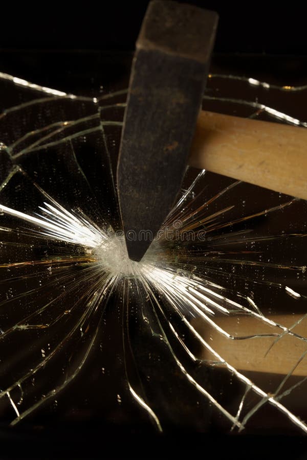 Hammer breaking a mirror stock photo. Image of focus - 358742134
