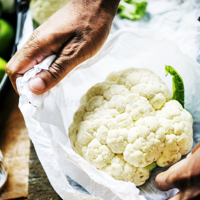 Cauliflower with plastic stock image. Image of diet, leaf - 42464083