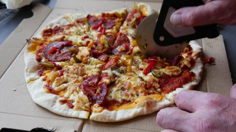 Cutting a Pizza with Precision and Style Stock Video - Video of ...