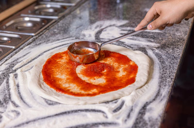 Closeup Hand of Chef Baker Making Pizza at Kitchen. the Process of ...