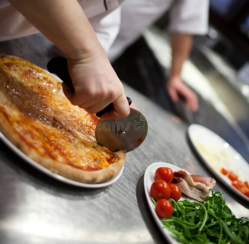Chef Making Pizza at Kitchen Stock Photo - Image of chef, board: 35589184