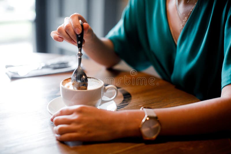 Closeup of Hand with Coffee Cup in a Cafe Stock Photo - Image of female ...