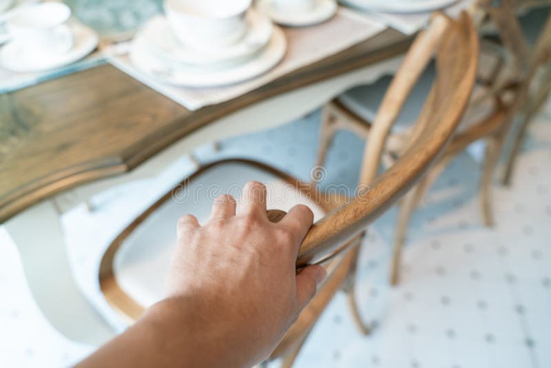 Hand Drag to Move up Chair stock image. Image of flowers - 127579635