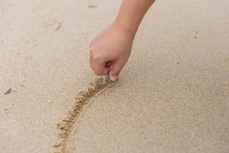 Writing on sand stock image. Image of word, written - 126745215