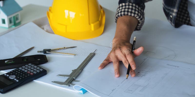 Closeup Hand of Engineer with Construction Work Plan Discussion ...