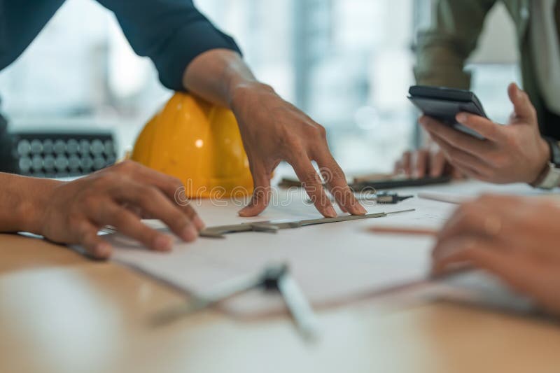 Asian Male Engineer Standing at Construction Site and Communicating ...