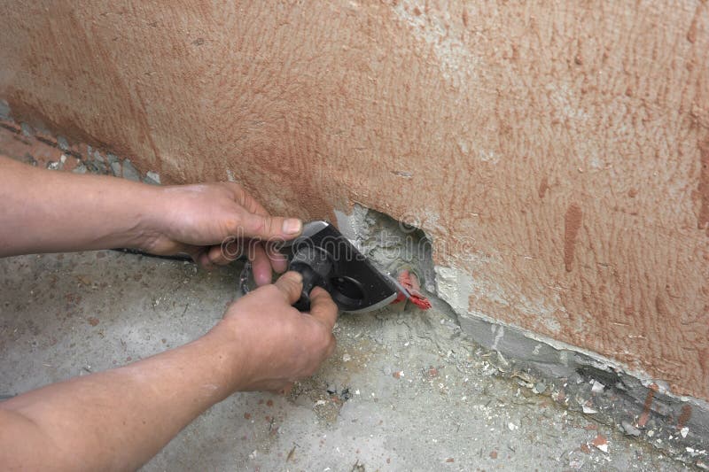 Hand fixing a socket stock photo. Image of fixing, socket - 207459310