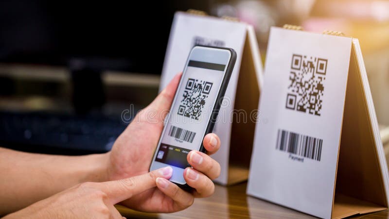 Closeup of a Hand Holding Phone and Scanning Qr Code. Man Hand Paying ...