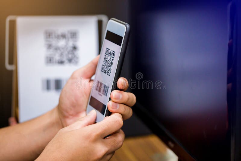 Closeup of a Hand Holding Phone and Scanning Qr Code. Man Hand Paying ...
