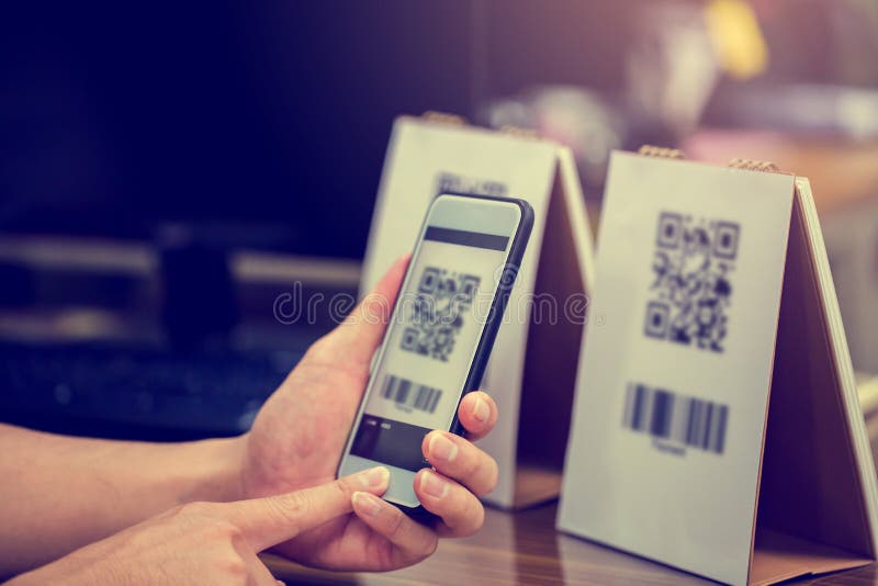 Closeup of a Hand Holding Phone and Scanning Qr Code. Man Hand Paying ...