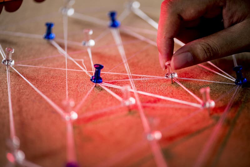 Closeup of Hand Holding Pins with Threads Stock Image - Image of ...