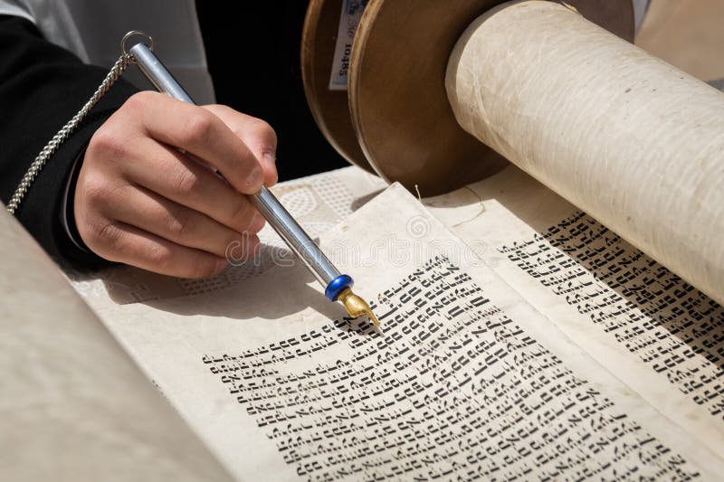 A Reader of the Torah Uses a Yad or Pointer As a Guide Stock Photo ...