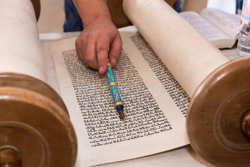 A Reader of the Torah Uses a Yad or Pointer As a Guide Stock Photo ...