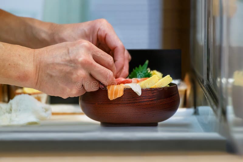 Closeup of Hand of Japanese Sushi Chef Stock Image - Image of bowl ...