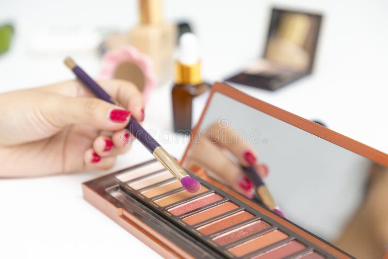 Closeup of Hand Makeup Artist Testing Different Eyeshadows Stock Image ...