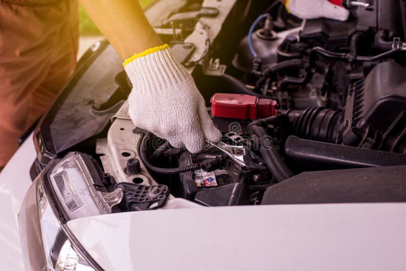 Closeup of Hand Mechanic Engineer Fixing Car Battery at Garage Stock ...