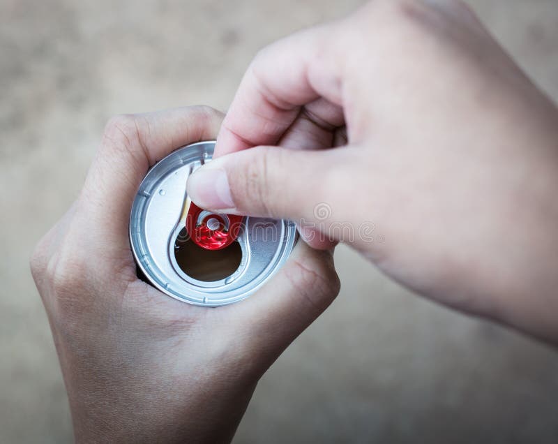 Closeup hand opening can stock image. Image of drink - 64460925